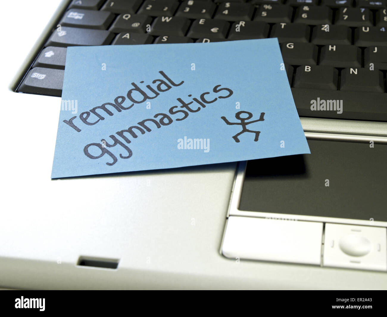 Memo note on notebook, remedial gymnastics Stock Photo - Alamy