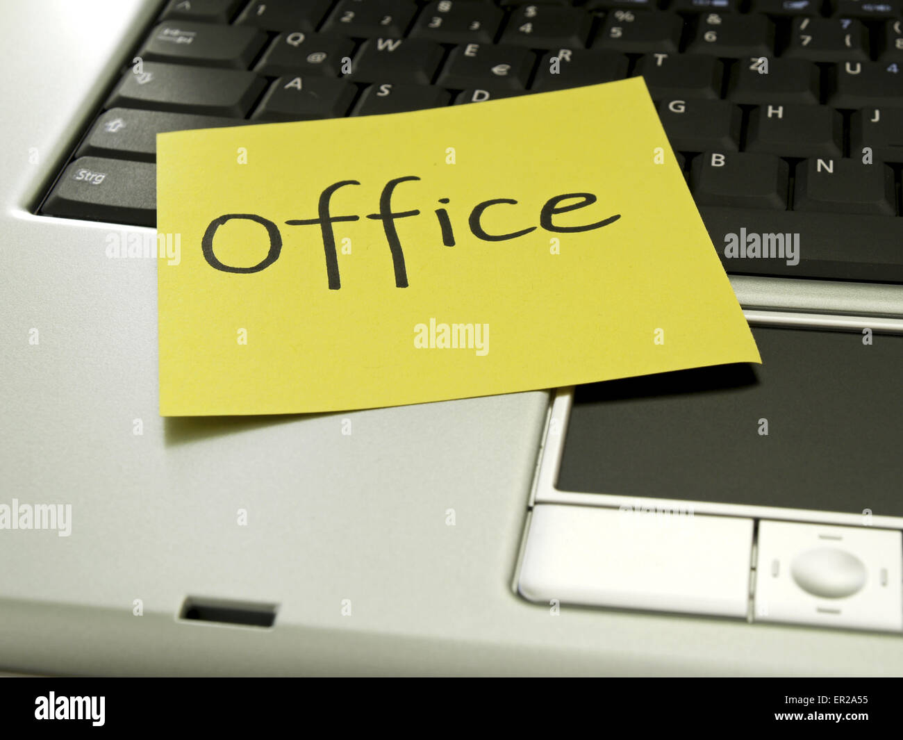 Memo note on notebook, office Stock Photo - Alamy