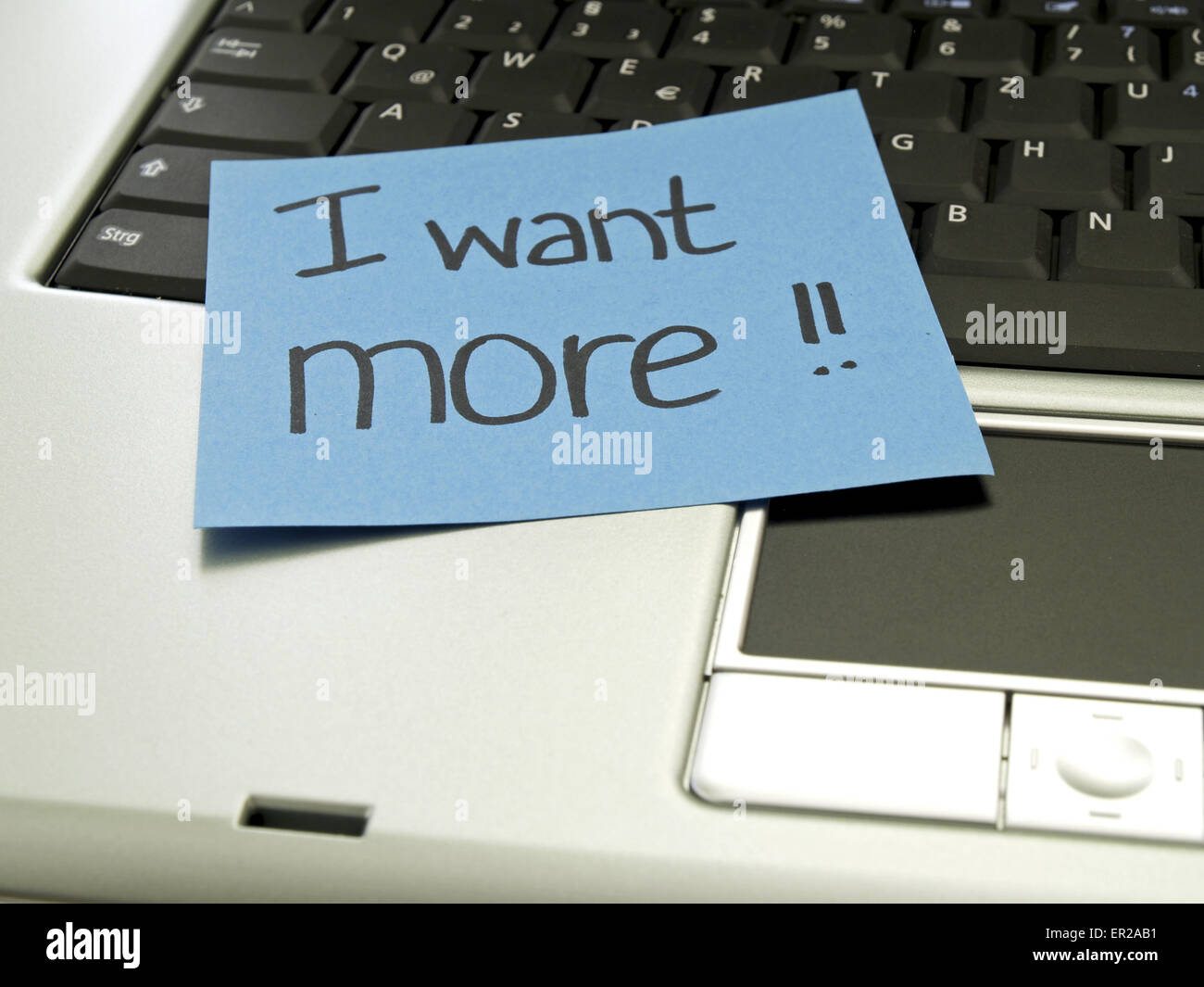 Memo note on notebook, I want more Stock Photo - Alamy