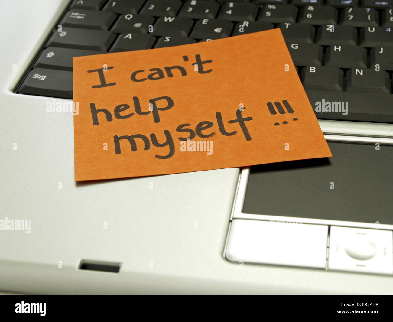 Memo note on notebook, I can´t help myself Stock Photo - Alamy
