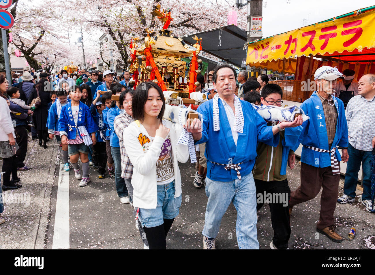 The yearly Genji parade in Tada, Japan. Team of men lifting and ...