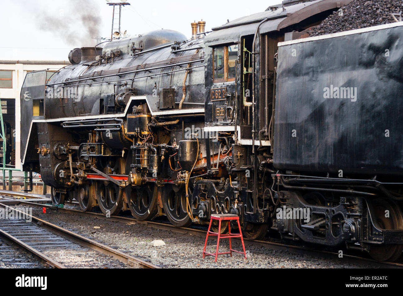 A 1954 C622 class Japanese railway locomotive getting stream upgetting ...