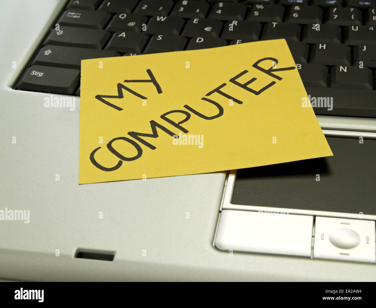 Memo note on notebook, my computer Stock Photo - Alamy