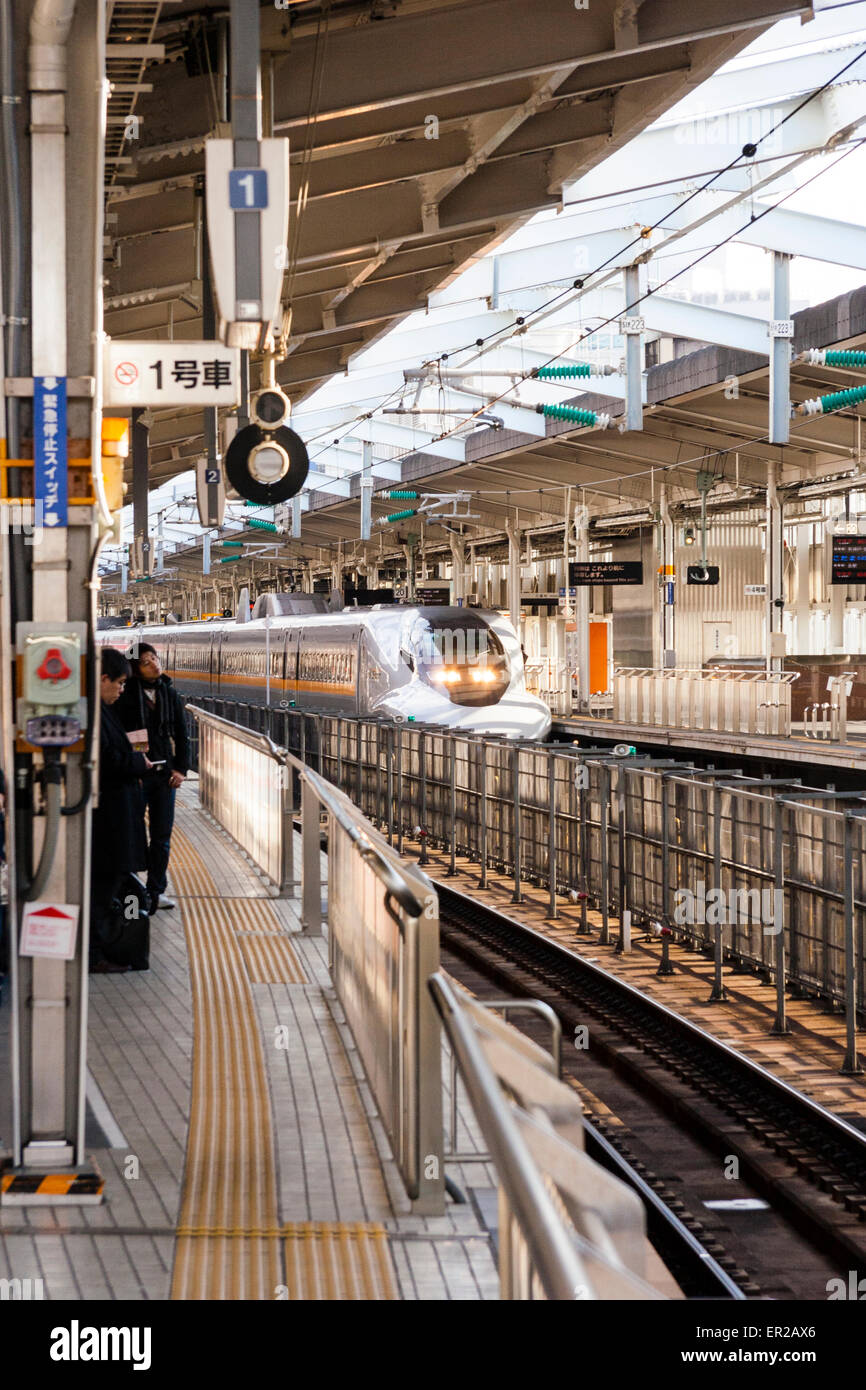 Shin Osaka station in Japan. A 700 series Shinkansen, bullet train, in ...