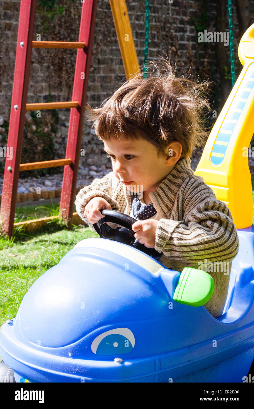 5 year old child driving car hi-res stock photography and images - Alamy