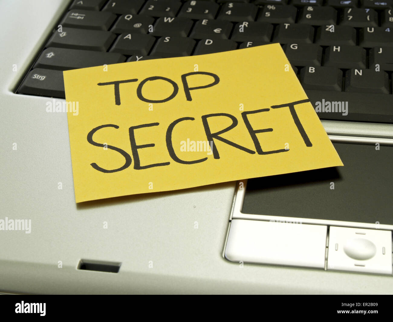 Memo note on notebook, top secret Stock Photo - Alamy