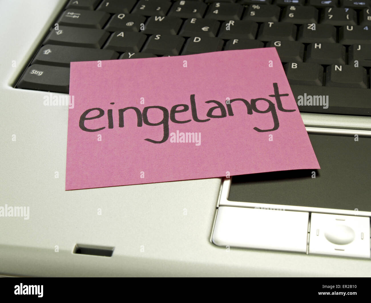 Memo note on notebook, received Stock Photo - Alamy