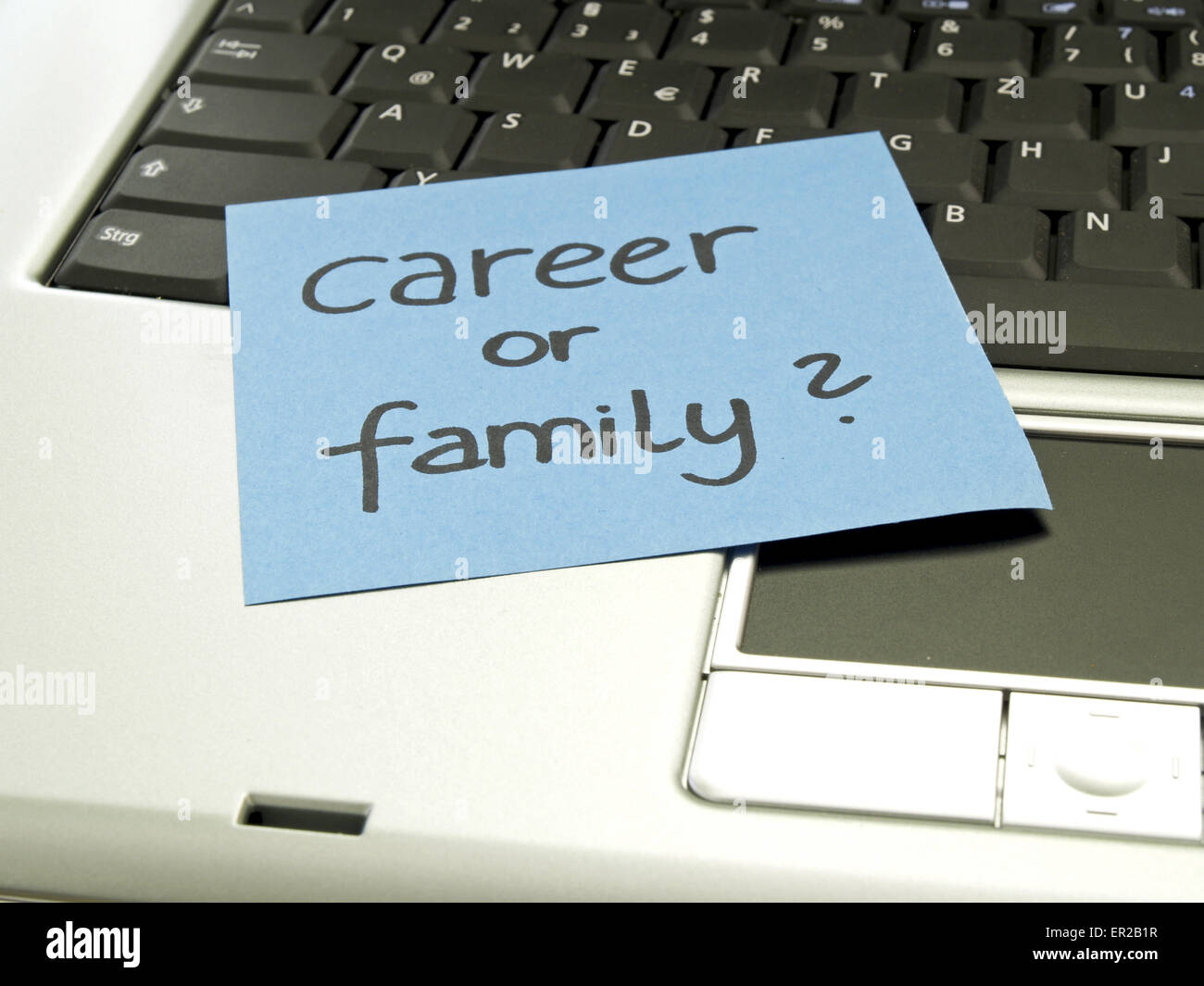 Memo note on notebook, career or family Stock Photo - Alamy
