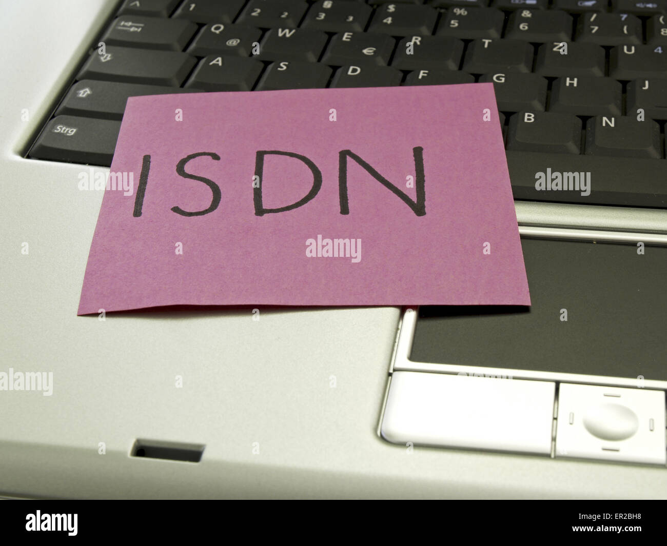 Memo note on notebook, ISDN Stock Photo - Alamy