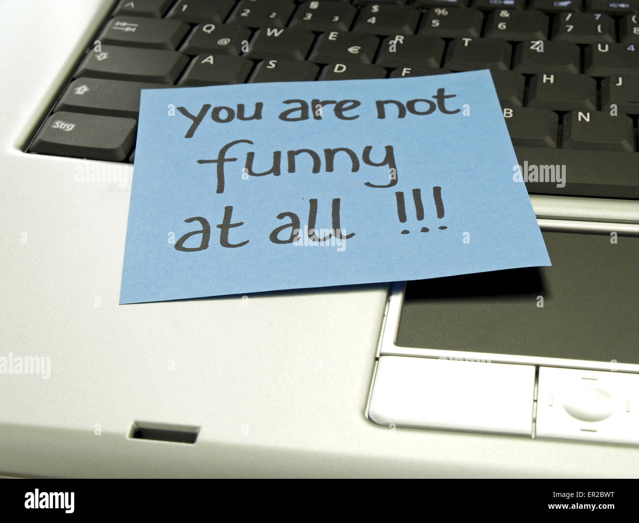 Memo note on notebook, you are not funny at all Stock Photo - Alamy
