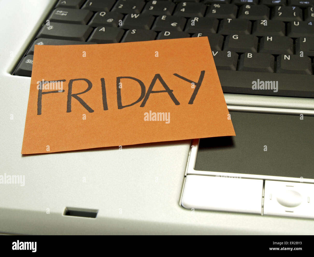 Memo note on notebook, Friday Stock Photo - Alamy