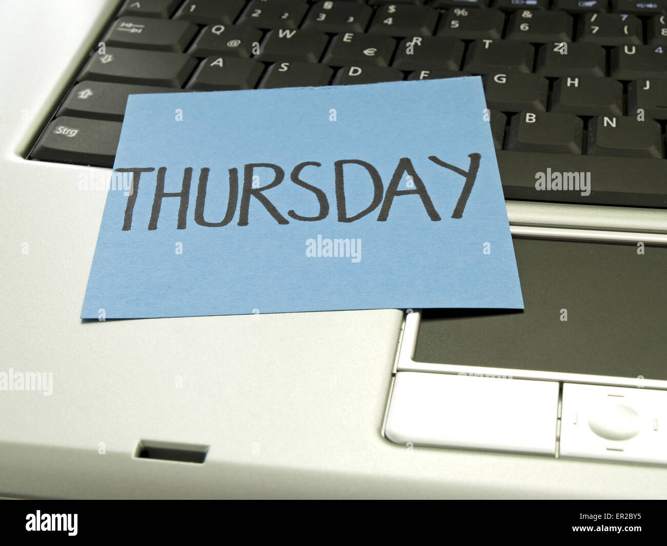 Memo note on notebook, Thursday Stock Photo - Alamy