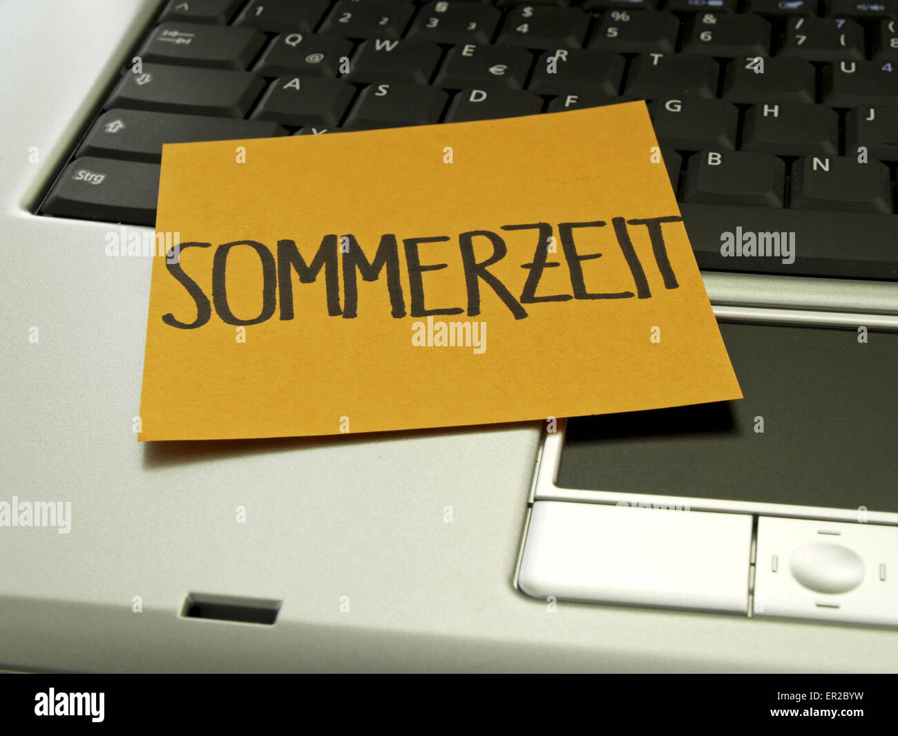Memo note on notebook, summer time Stock Photo - Alamy