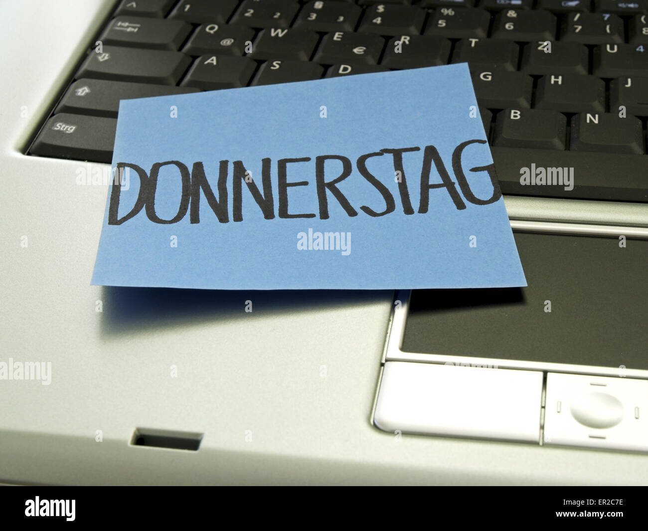 Memo note on notebook, Thursday Stock Photo - Alamy