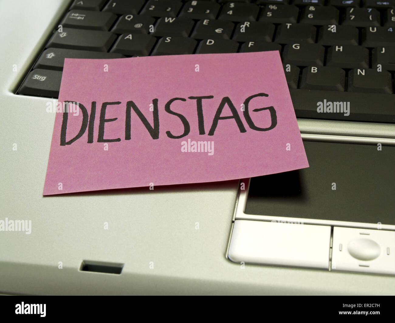 Memo note on notebook, Tuesday Stock Photo - Alamy