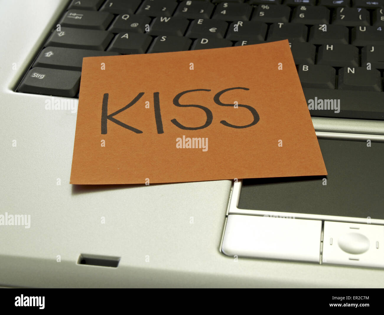 Memo note on notebook, kiss Stock Photo - Alamy