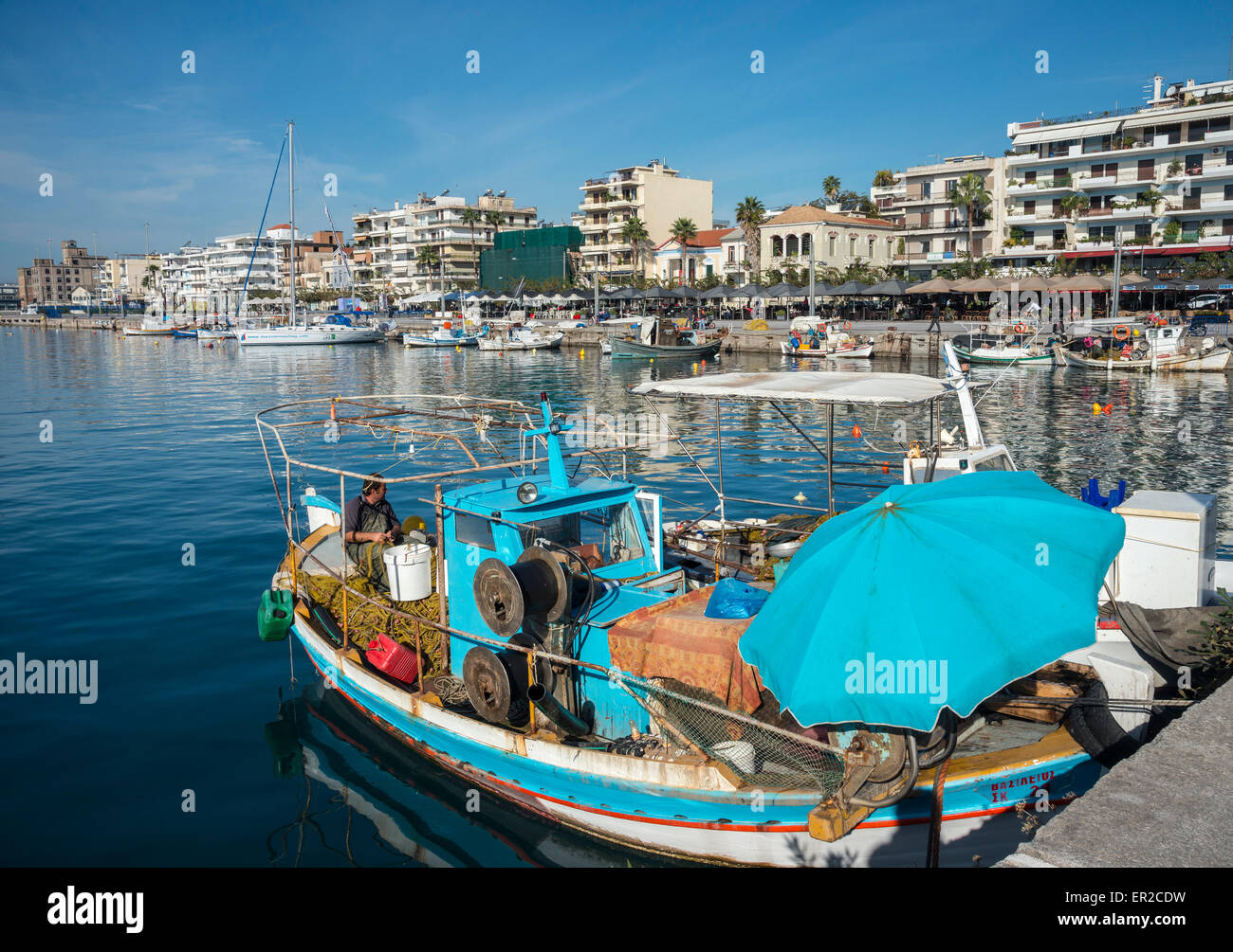 Fishermen and fishing boats in the harbour at Kalamata, Messinia ...