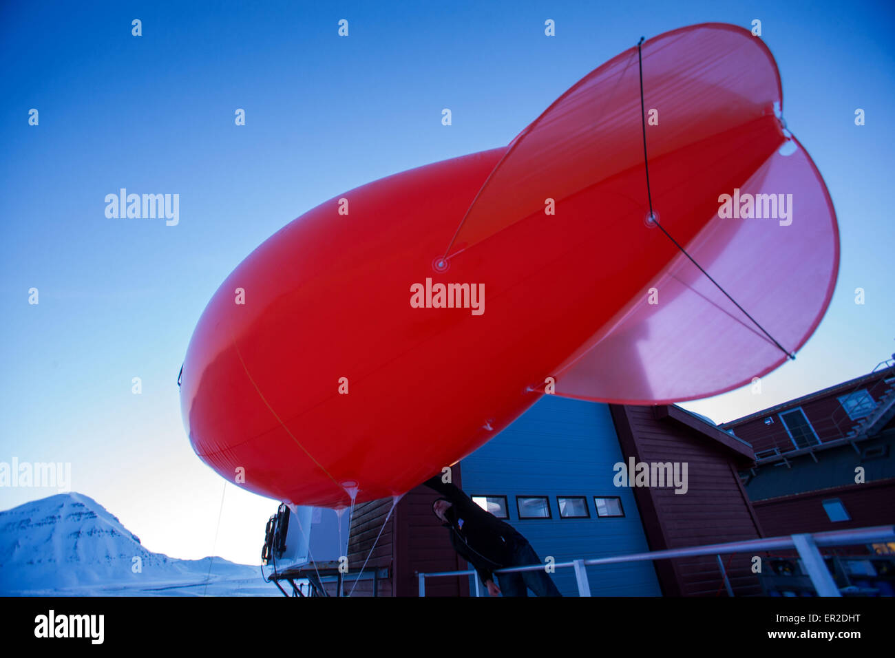 Technician Juergen Graeser of the atmospheric observatory of AWIPEV ...
