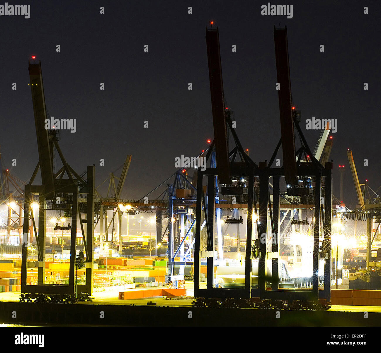 Commercial port at night Stock Photo - Alamy
