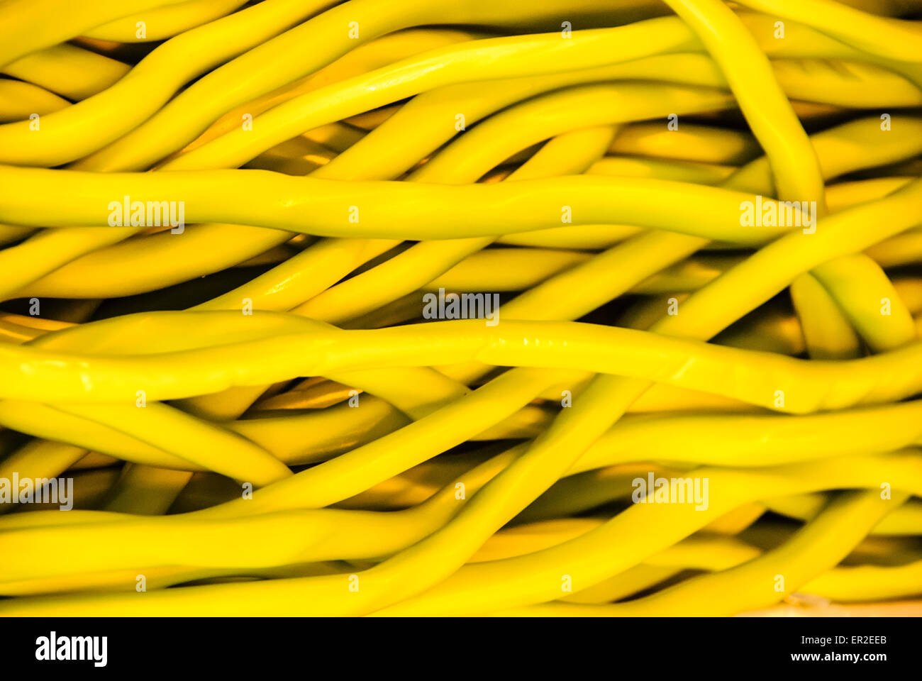 Pile of yellow ethernet network cables Stock Photo - Alamy