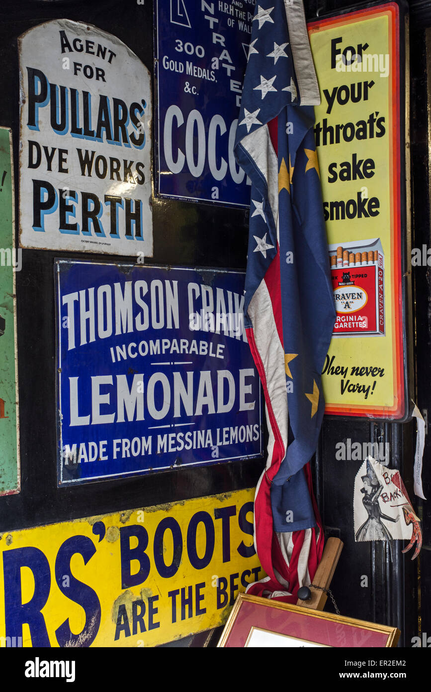Metal advertising signs at the entrance to an antique shop on Cockburn ...