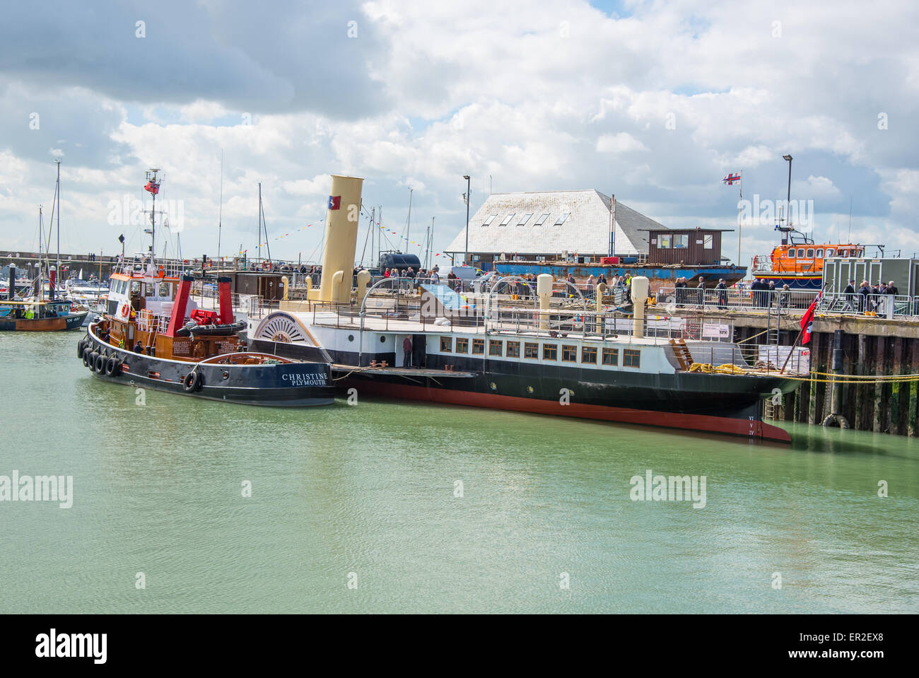 The Medway Queen, together with the tug Christine at Ramsgatewhen ...