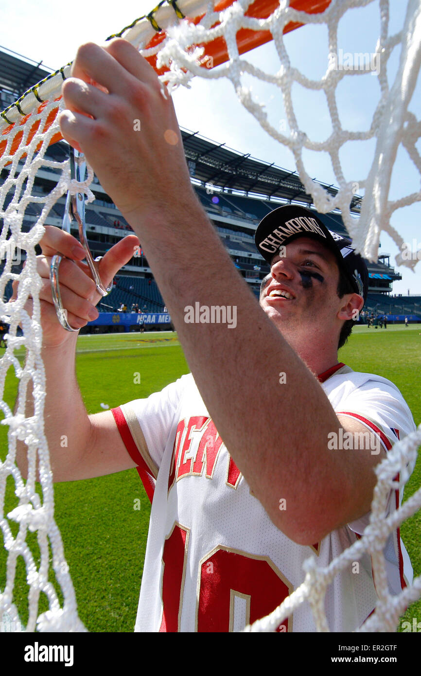 May 25, 2015: Denver Pioneers goalie Ryan LaPlante (10) cuts a piece of ...