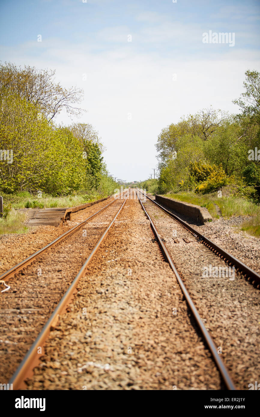 Railway track going into the distance Stock Photo - Alamy