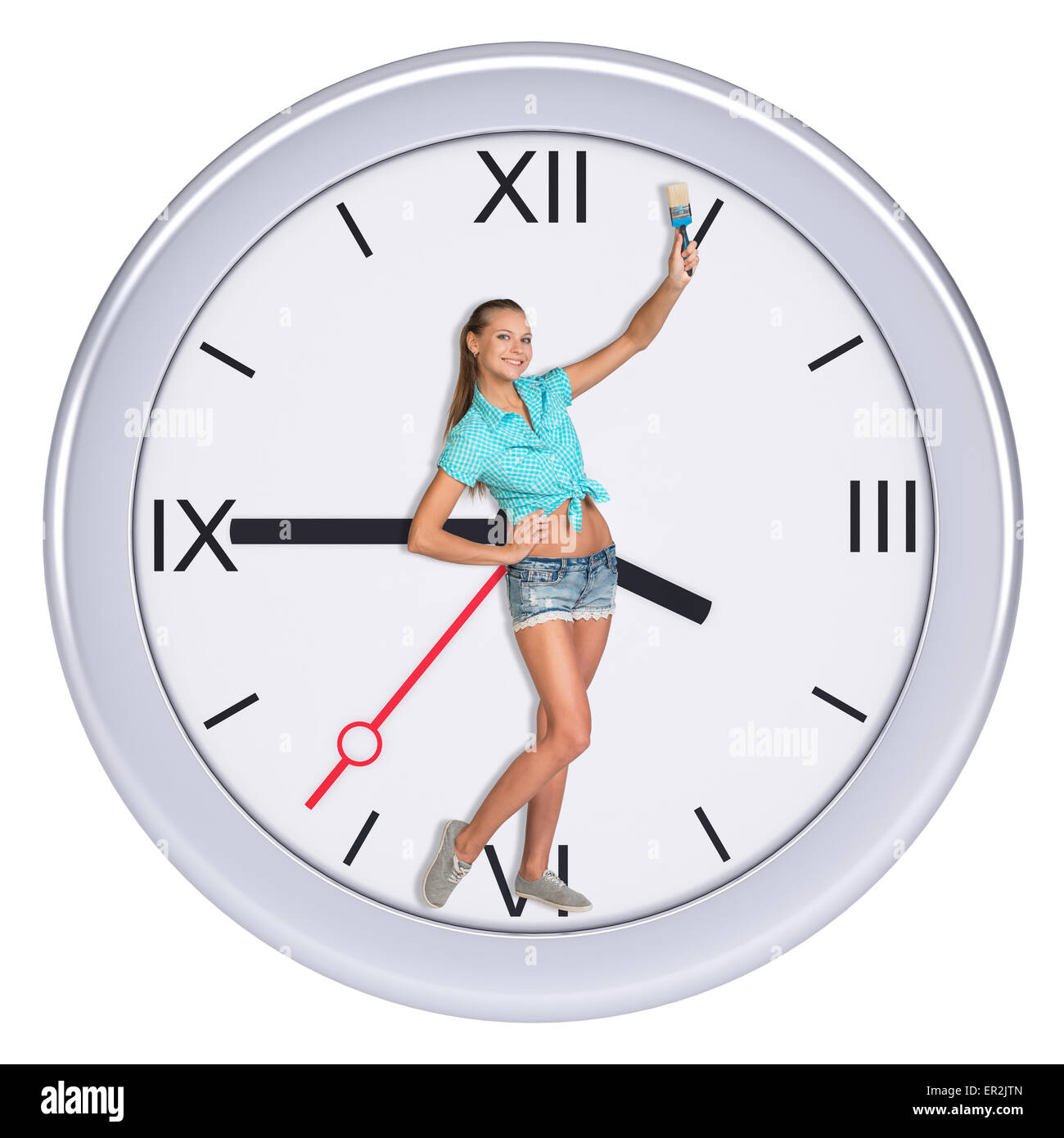 Young woman standing in center of clock Stock Photo - Alamy