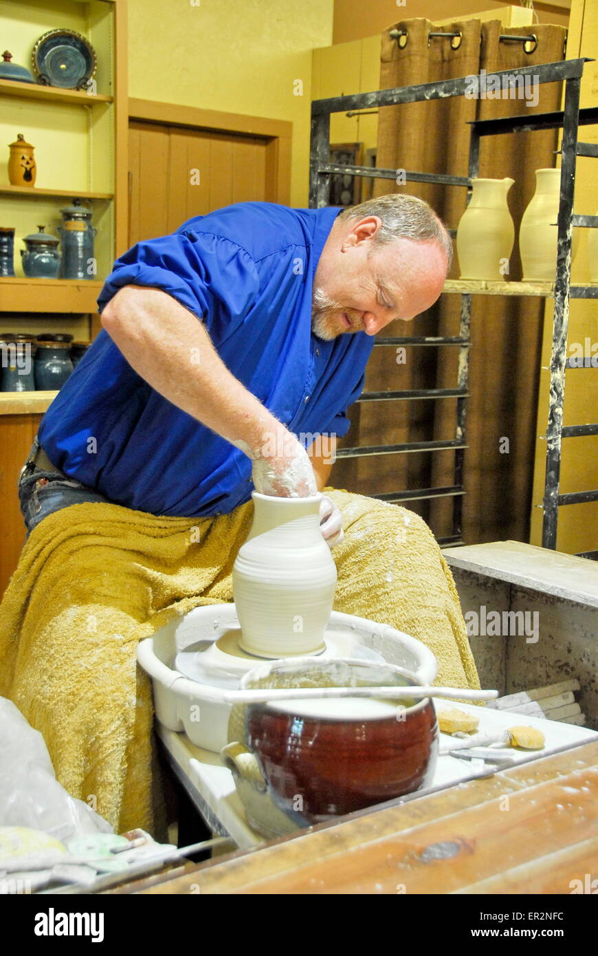 Pottery craftsman at Silver Dollar City theme park, Branson, Missouri ...