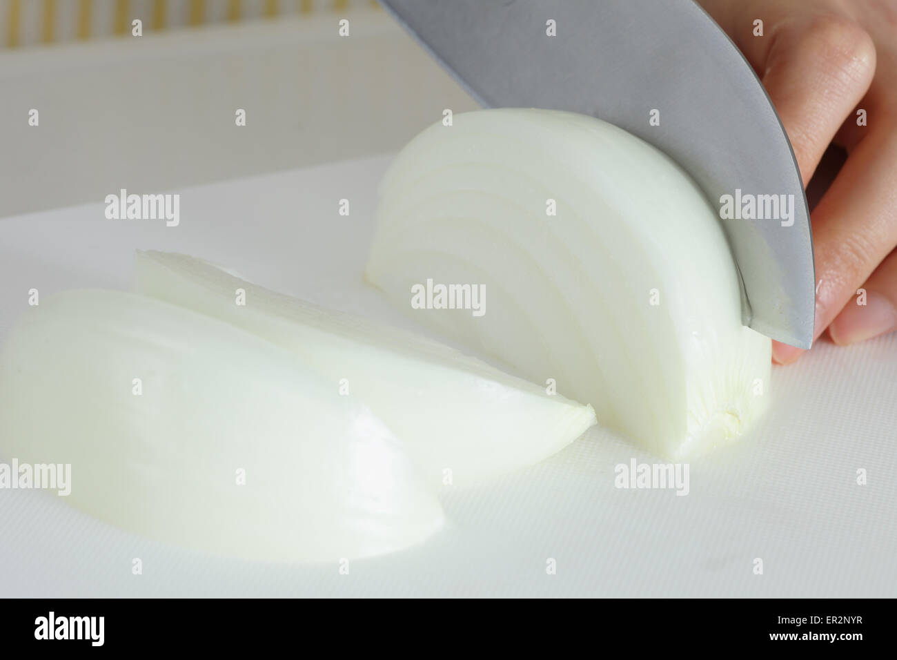 Womans hand cut onions hi-res stock photography and images - Alamy