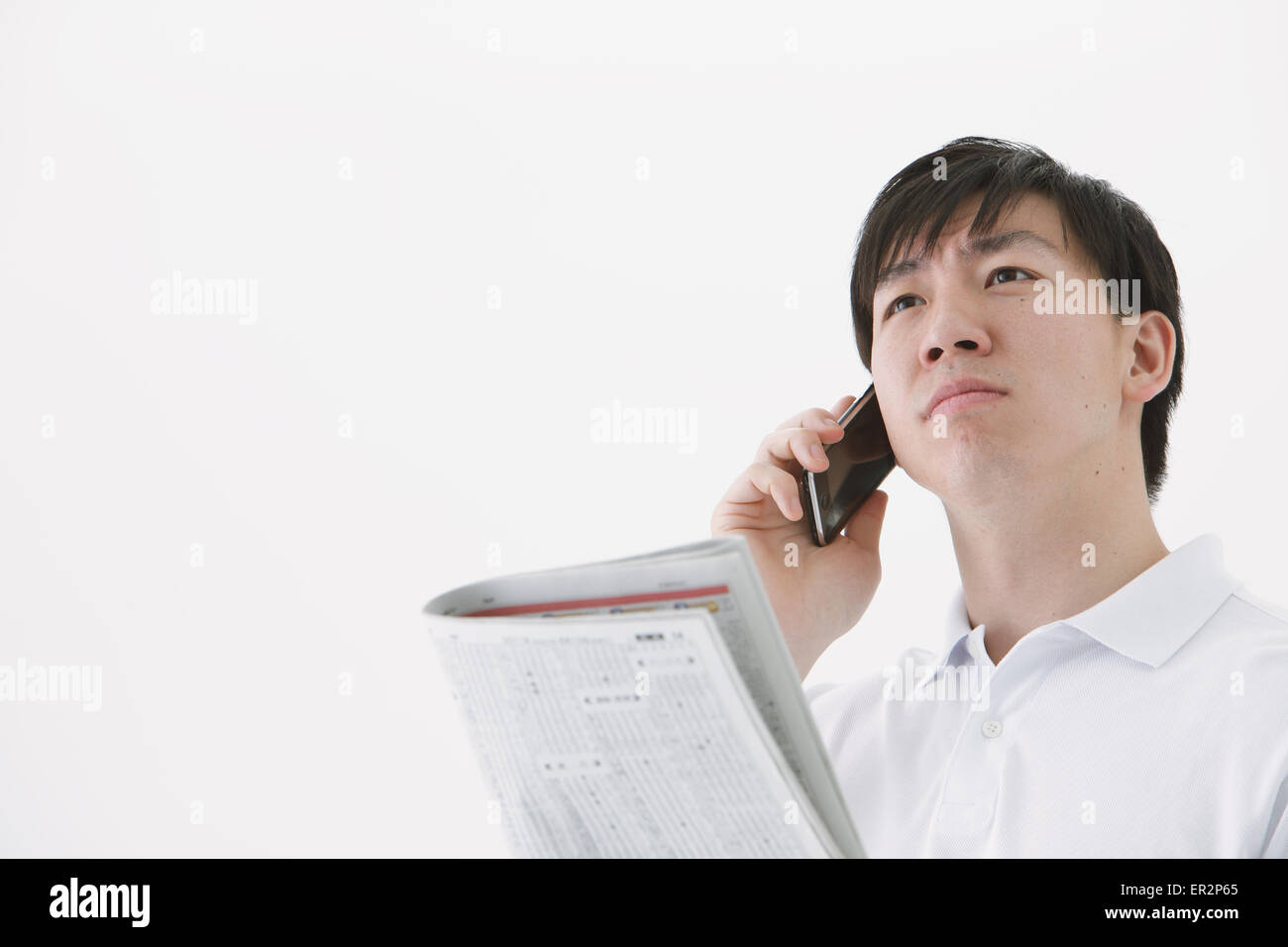 Telephone newspaper hi-res stock photography and images - Alamy