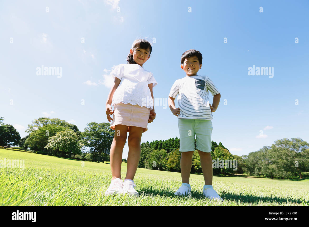 Happy Japanese kids in a city park Stock Photo - Alamy