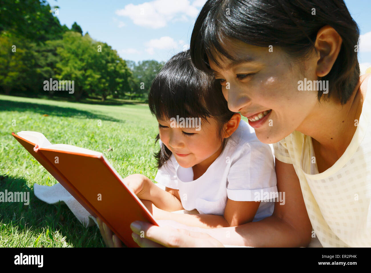 Daughter reading hi-res stock photography and images - Alamy