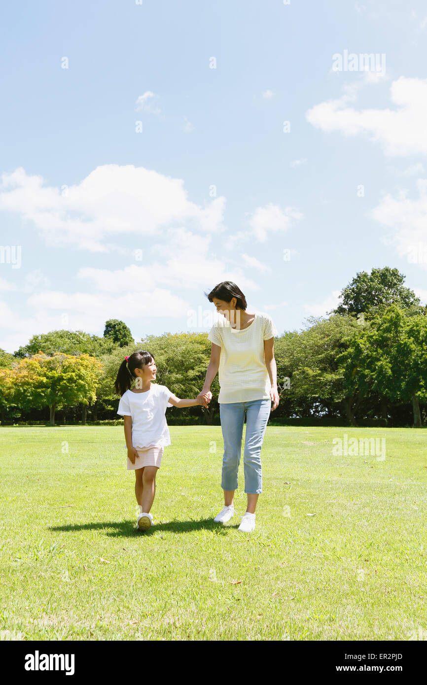 Japanese mother and daughter in a city park Stock Photo - Alamy