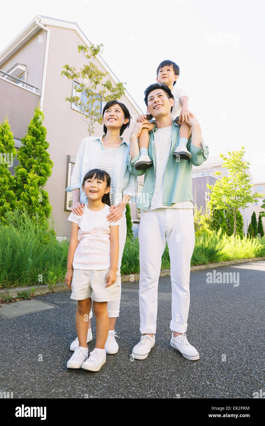 Happy Japanese family in a city park Stock Photo - Alamy