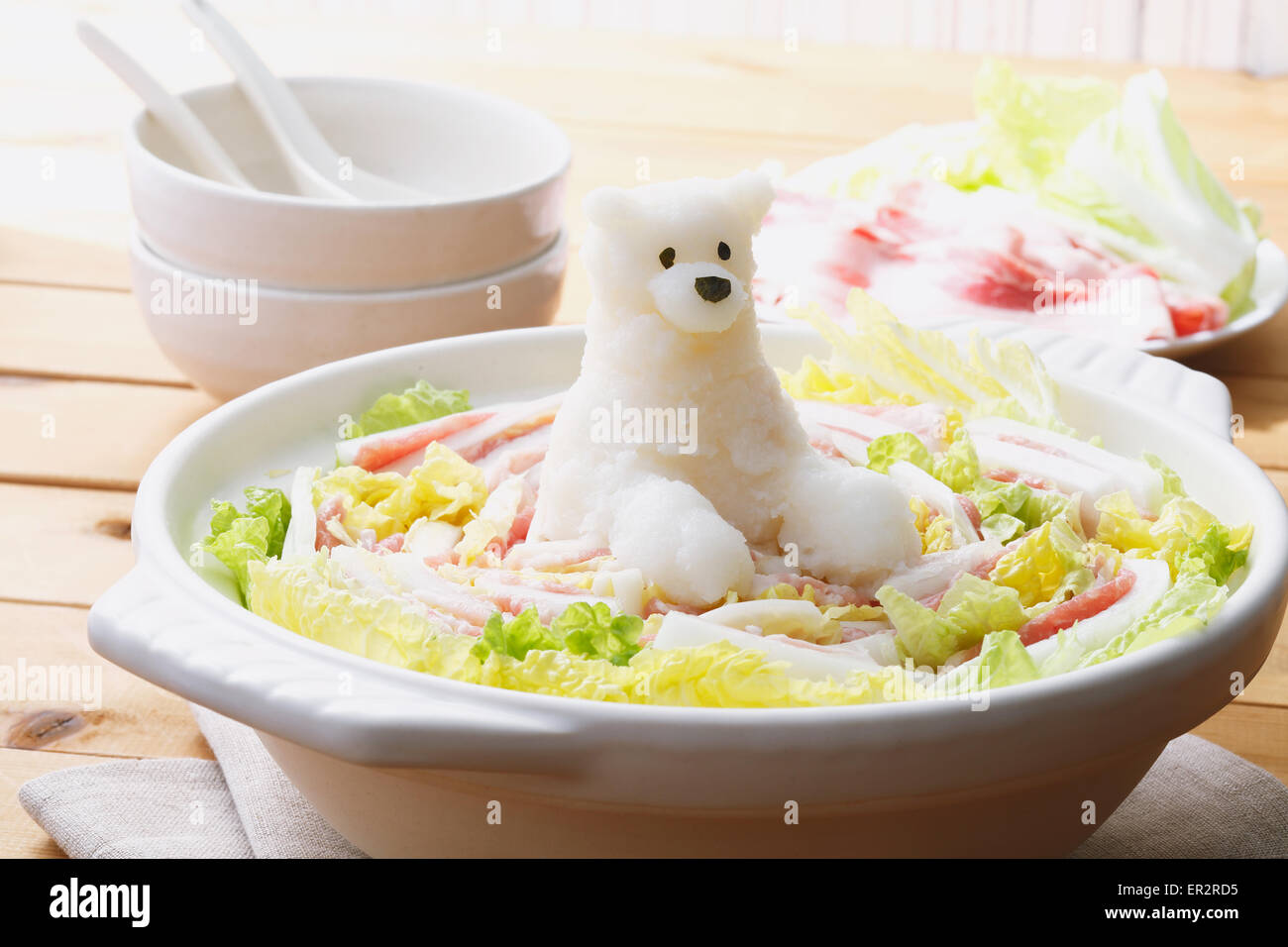 Japanese style casserole with grated radish animal decoration Stock ...