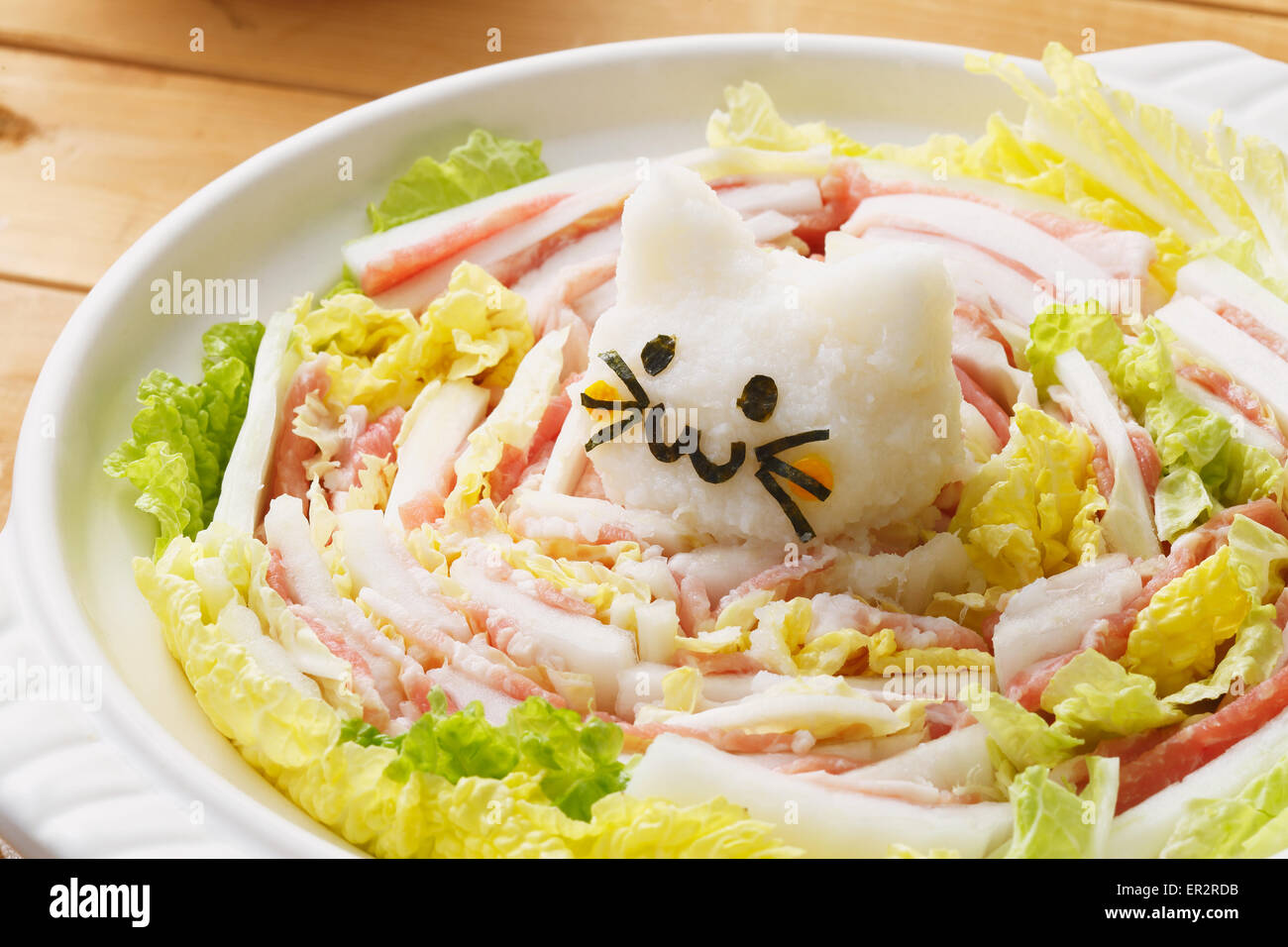 Japanese style casserole with grated radish animal decoration Stock ...