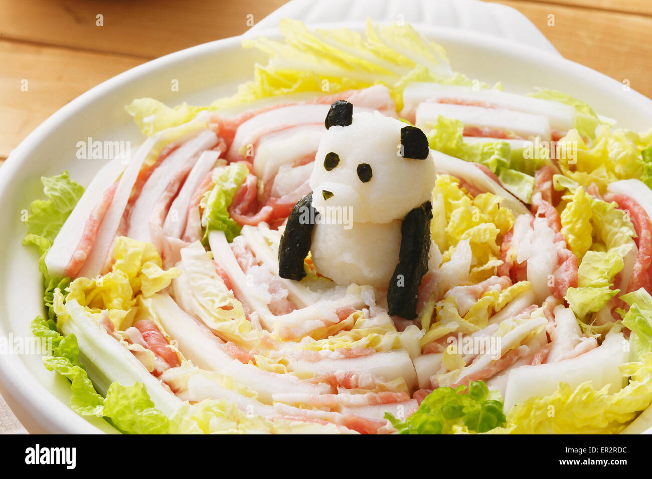 Japanese style casserole with grated radish animal decoration Stock ...