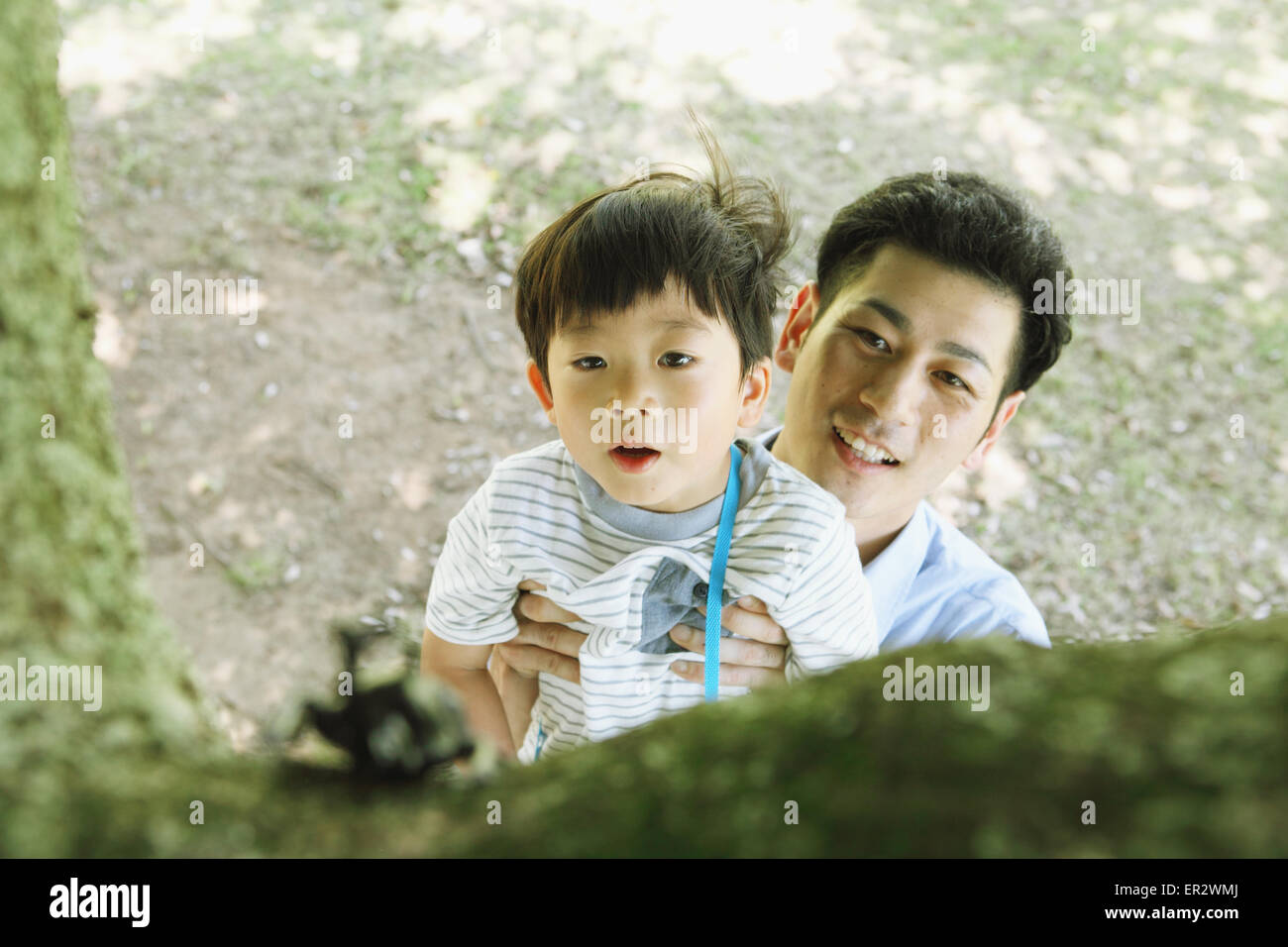 Family catching insects in hi-res stock photography and images - Alamy