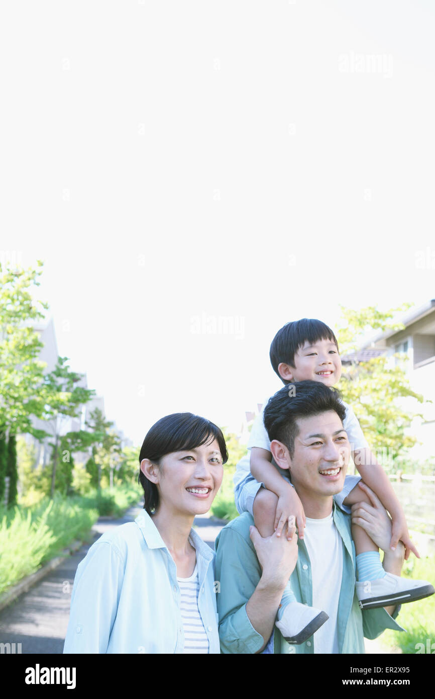Happy Japanese family in a city park Stock Photo - Alamy