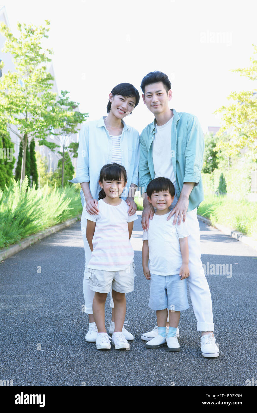Happy Japanese family in a city park Stock Photo - Alamy