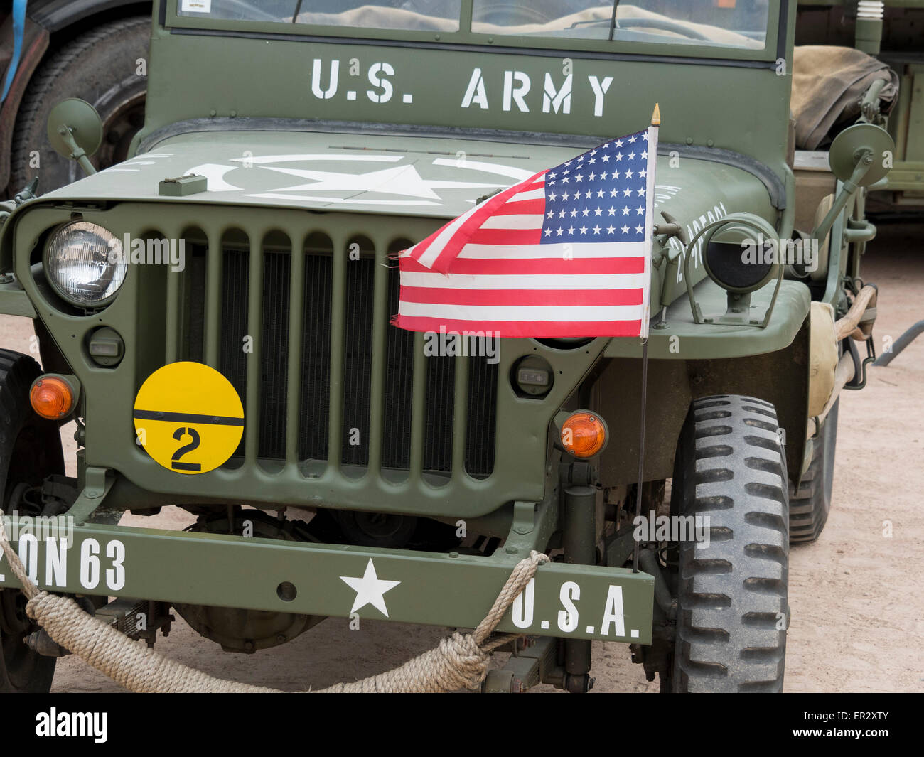 Front view of a Willys jeep with American flag (2nd World War Stock ...