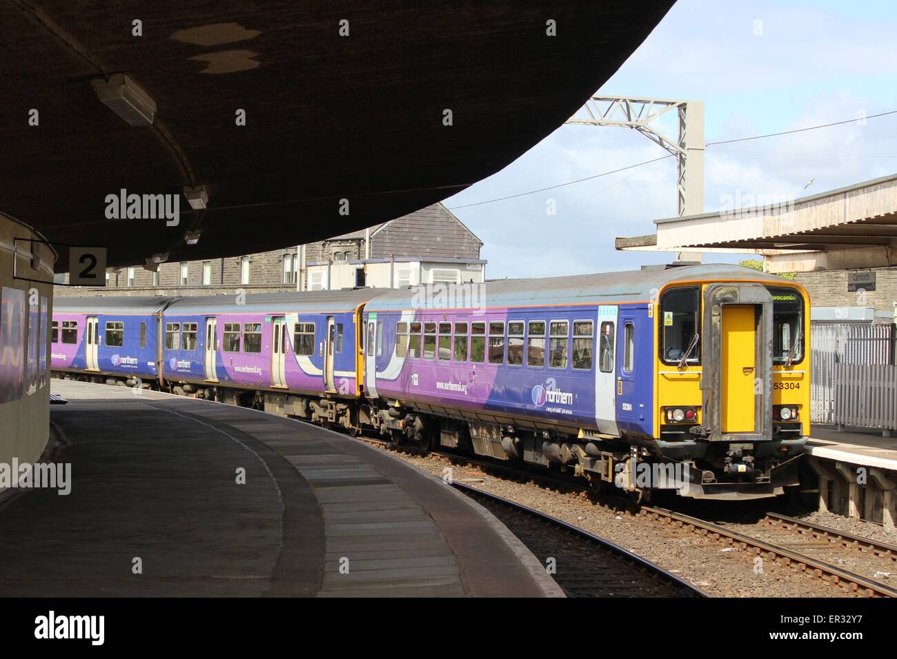 Class153 and 150 diesel units arriving at Carnforth railway station ...
