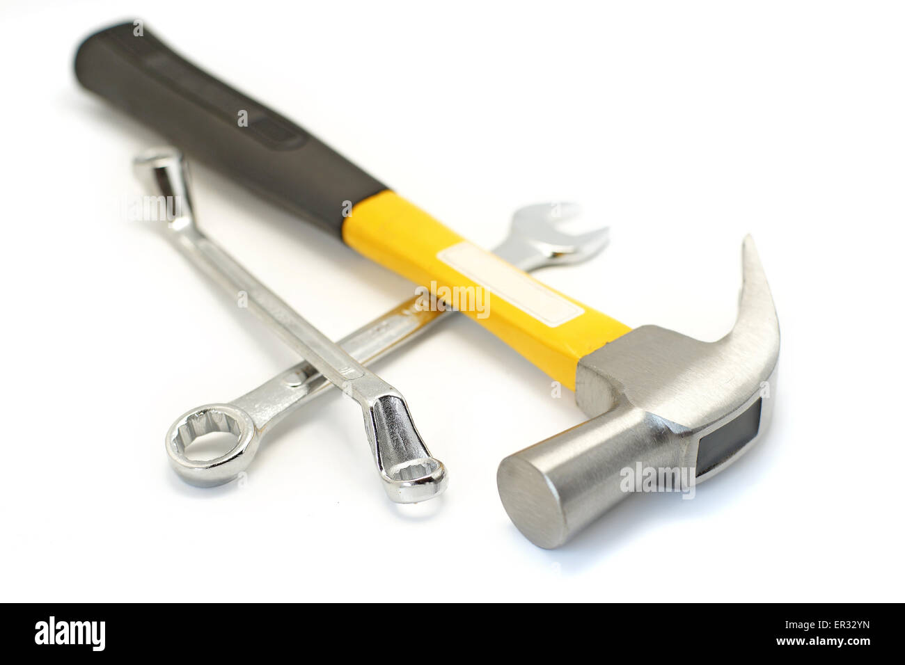 hammer and wrench isolated on white background Stock Photo - Alamy