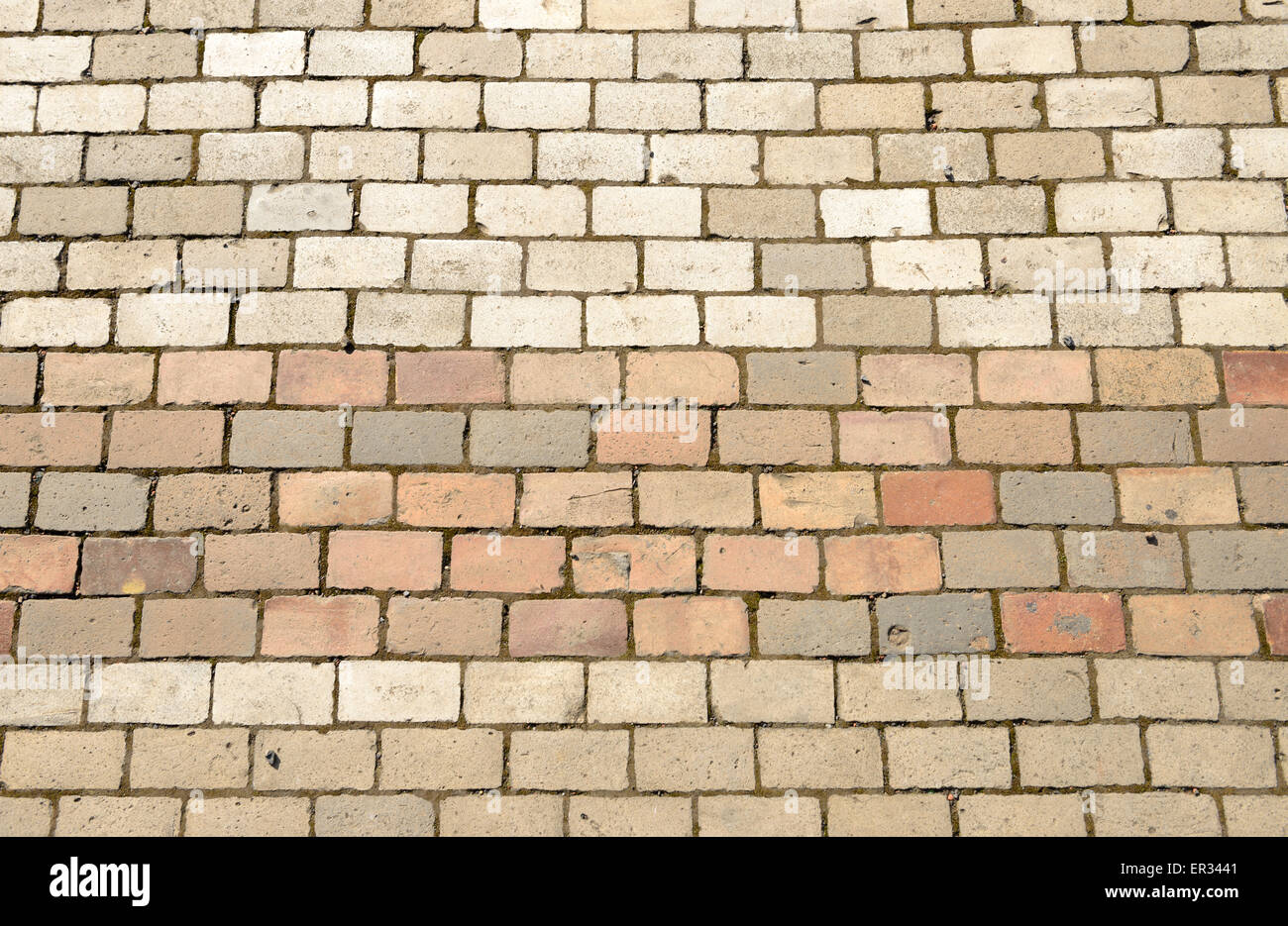 Tinted pavement bricks of beige and pinkish colors as background Stock ...