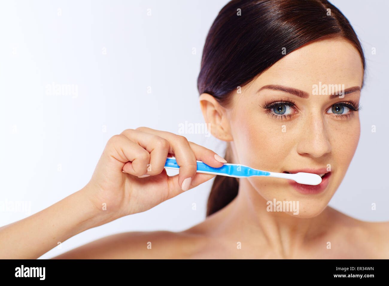 young woman with a toothbrush Stock Photo - Alamy