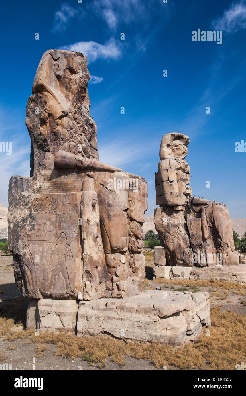 Colossi of Memnon statues in Luxor, Egypt Stock Photo - Alamy