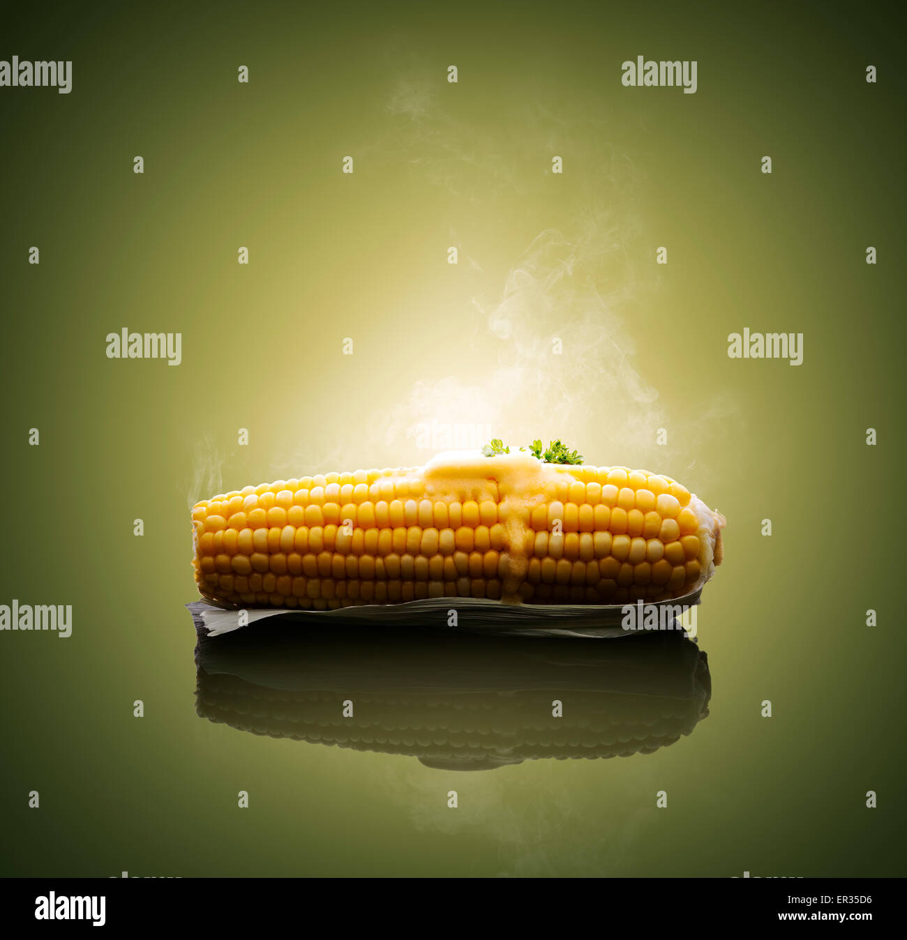 Cooked Ear of Corn with melting hot butter and steam Stock Photo - Alamy