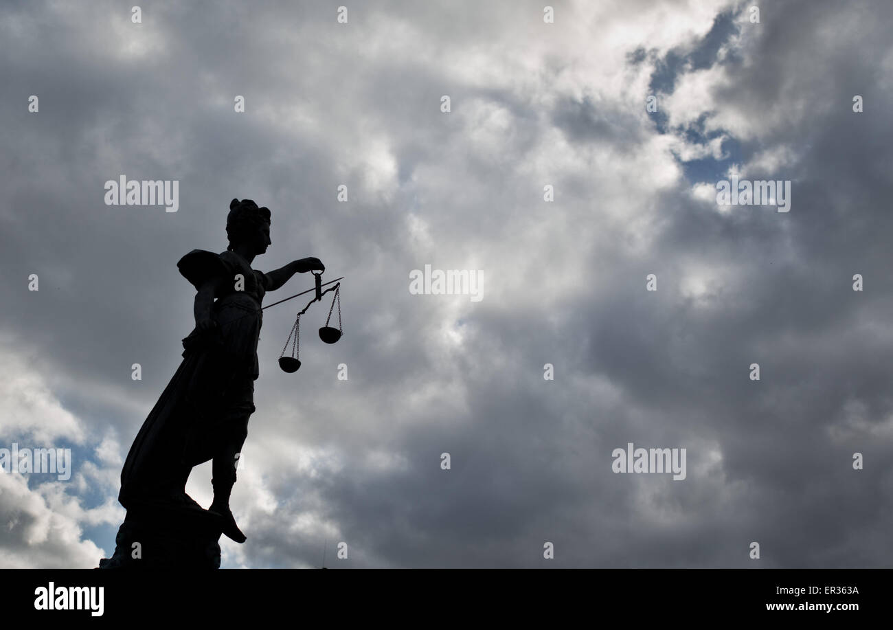 The statue of Justitia, the Roman goddess of justice, stands with a ...
